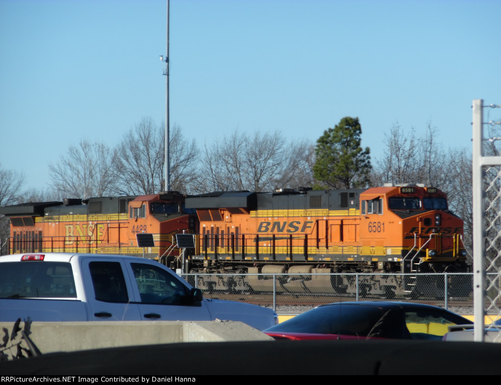 BNSF 6581 & BNSF 4488 idle at the south end of the yard